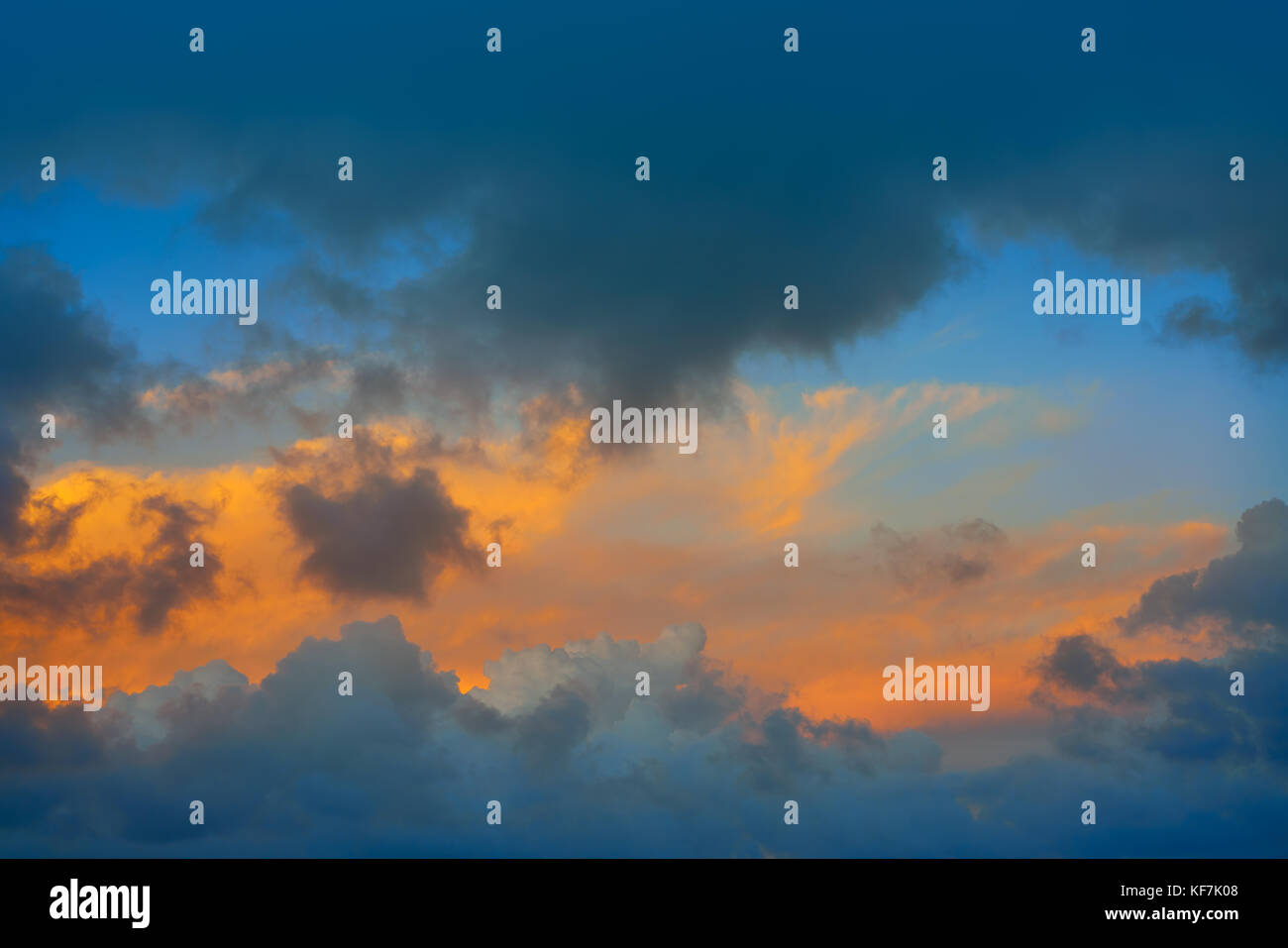 Dramatic clouds at sunset sky orange clouds Stock Photo - Alamy