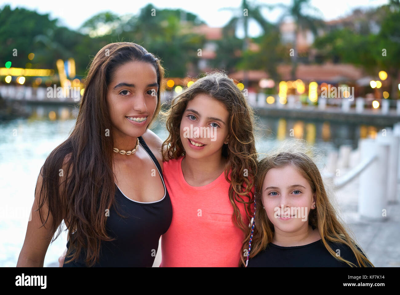 Friends girls portrait at sunset mixed ethnicity Stock Photo - Alamy