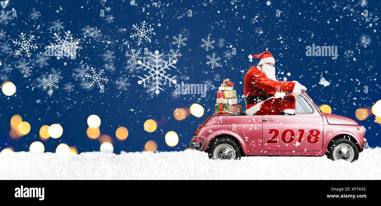 Santa Claus on car Stock Photo - Alamy