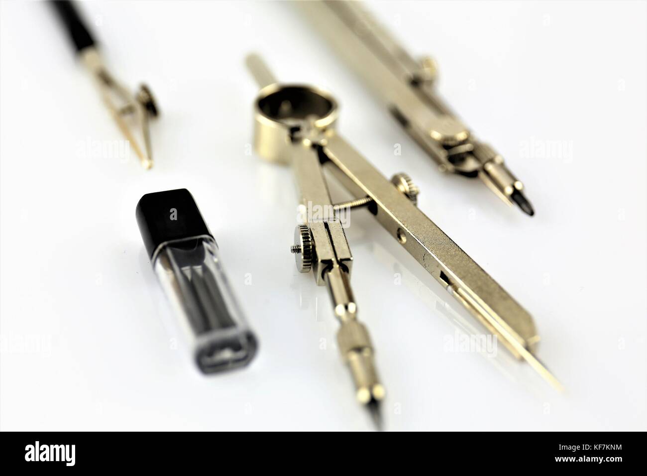 An image of a compasses tool - geometry Stock Photo - Alamy