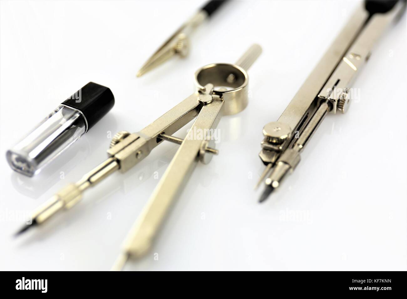 An image of a compasses tool - geometry Stock Photo - Alamy