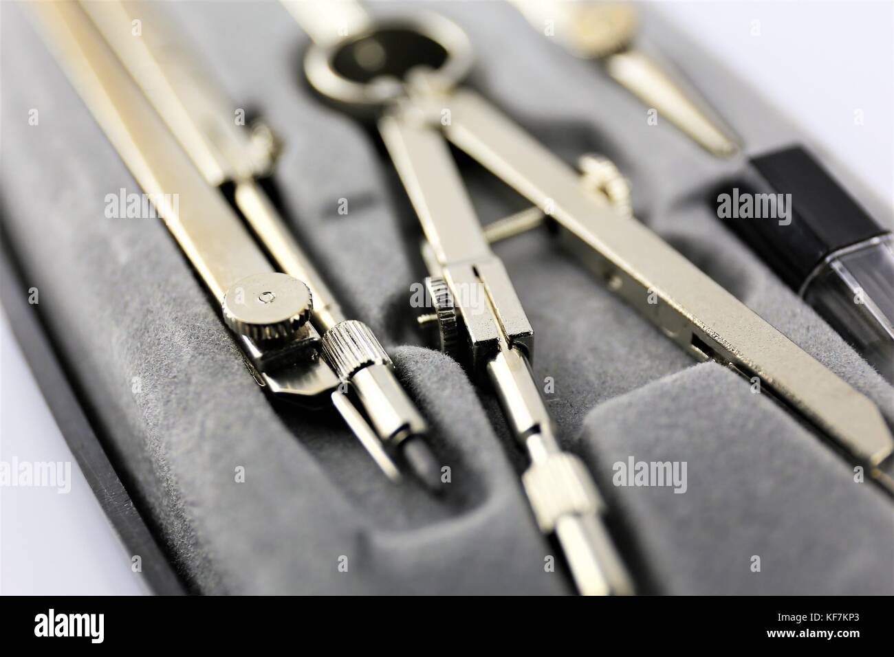An image of a compasses tool - geometry Stock Photo - Alamy