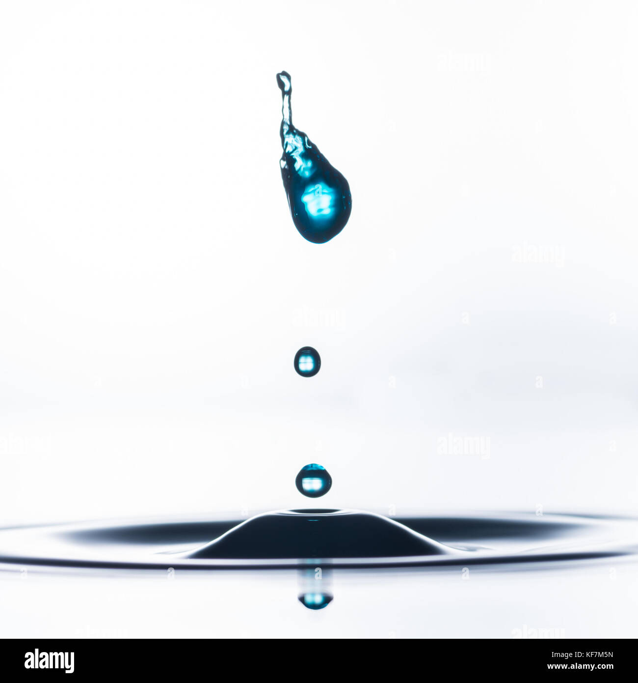 An abstract shot of a water drop collision that looks like a pear ...