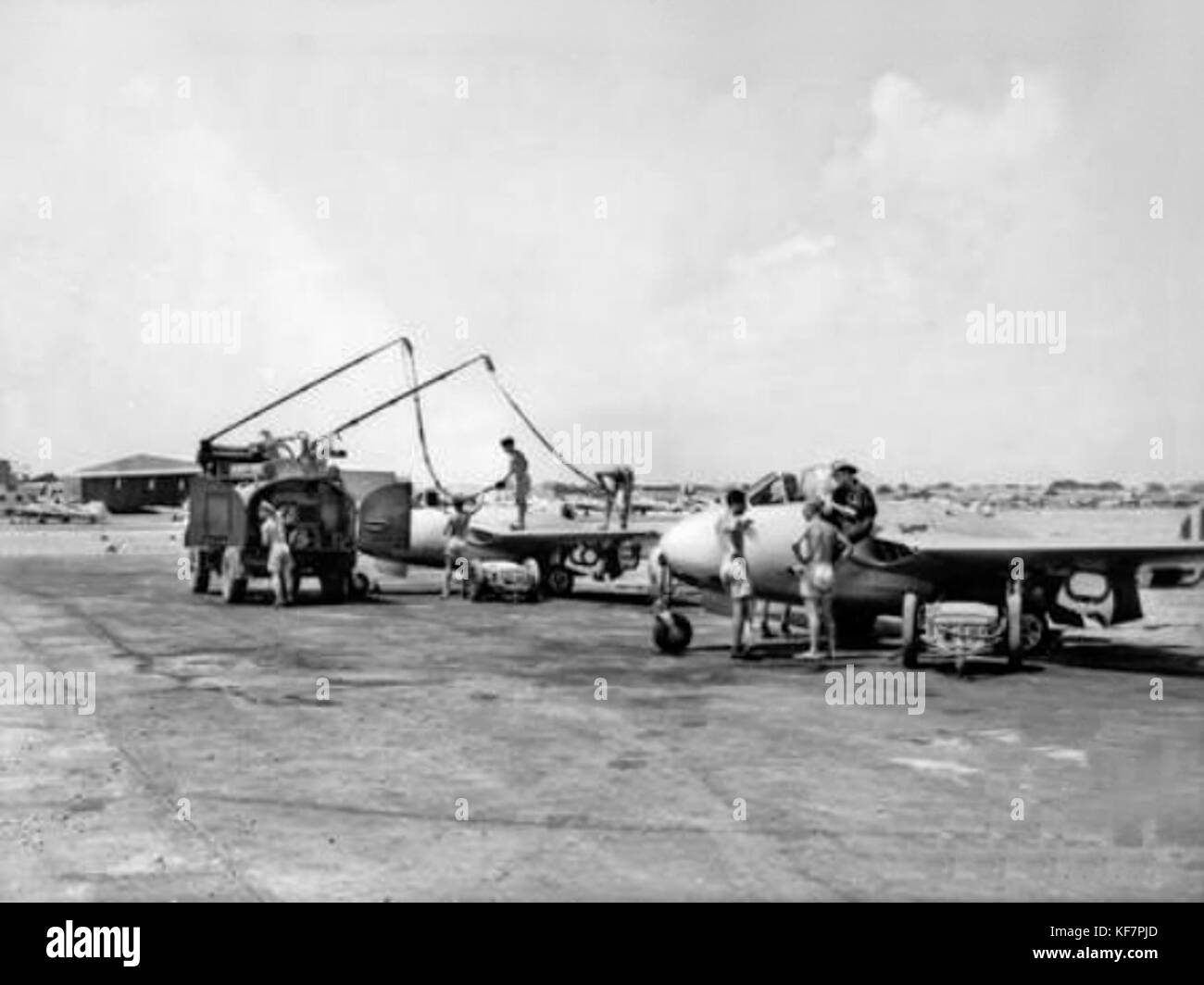 RAAF Vampire being refuelled at RAF Hal Far c1952 Stock Photo - Alamy