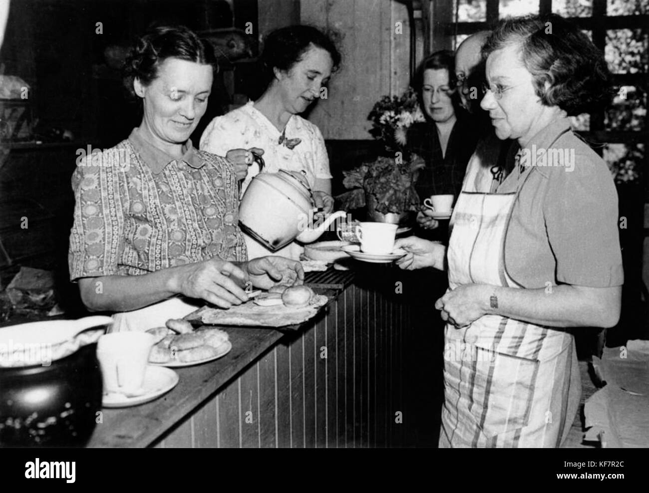 This photograph, taken in October 1942, shows a community kitchen in ...