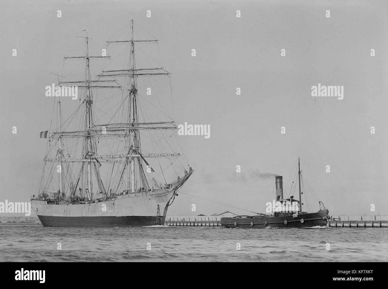 Jeanne d'Arc (ship, 1901) and Tugboat Racer SLV H91.325 924 Stock Photo ...