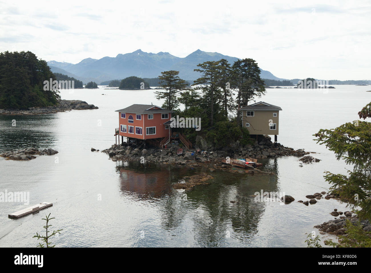 USA, Alaska, Sitka, homes perched on a small island in the Sitka Sound ...