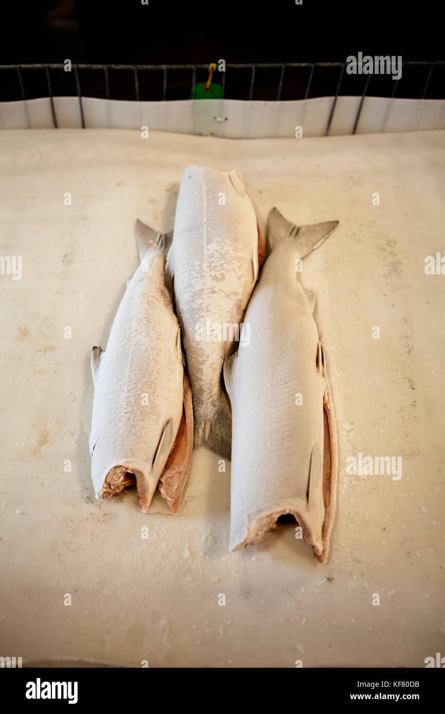 USA, Alaska, Sitka, frozen salmon are prepped for shipping, Sitka Sound ...