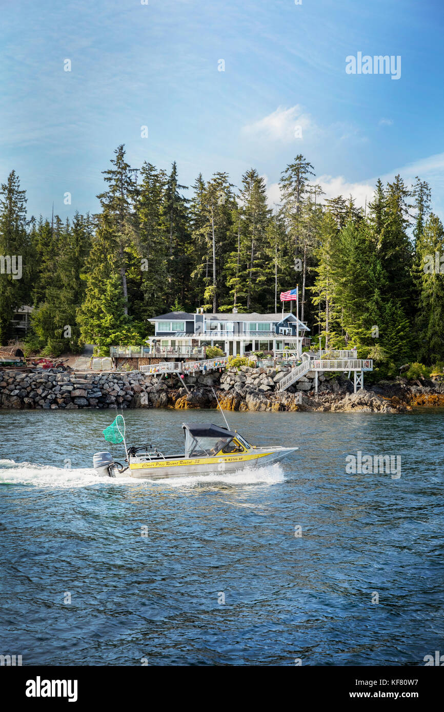 USA, Alaska, Ketchikan, a fishing boat makes its way out of the Behm ...