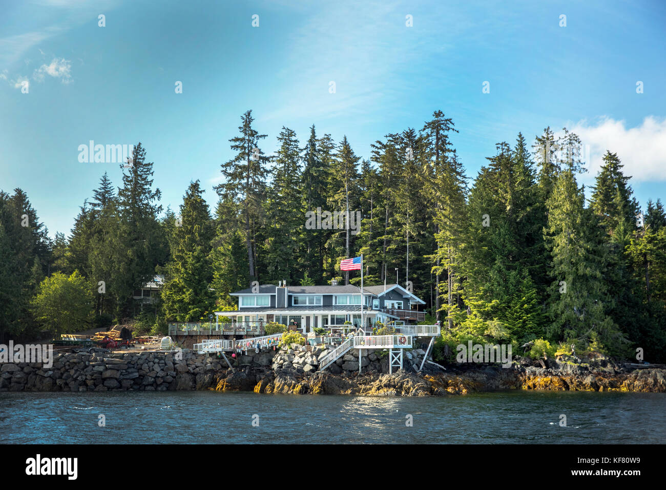 USA, Alaska, Ketchikan, a beautiful home nestled among the rocks in the ...