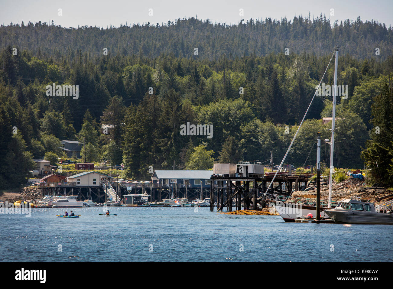 USA, Alaska, Ketchikan, a group of kayakers in the water off the Behm ...