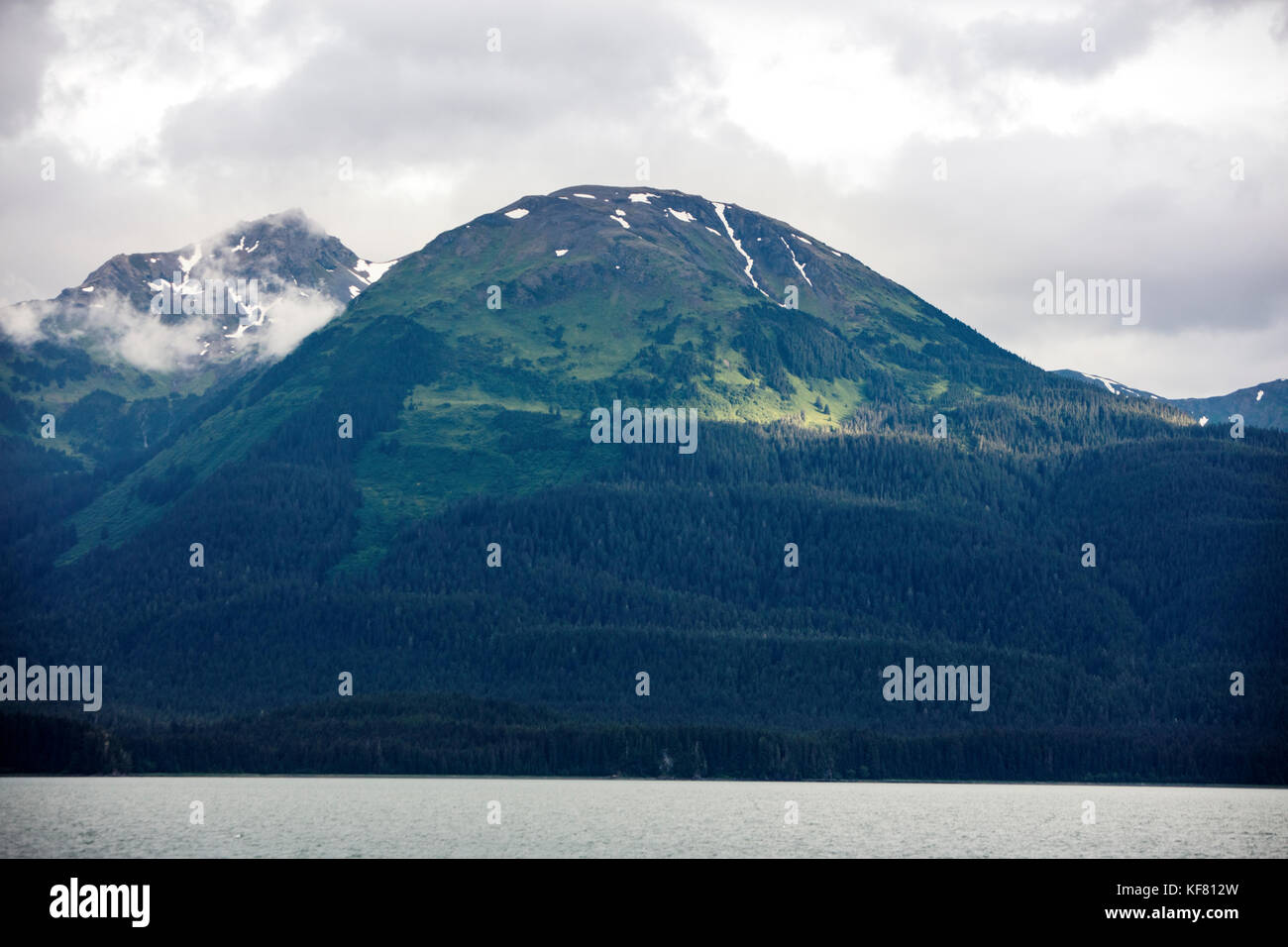 USA, Alaska, Juneau, views of snowcapped mountains while whale watching ...