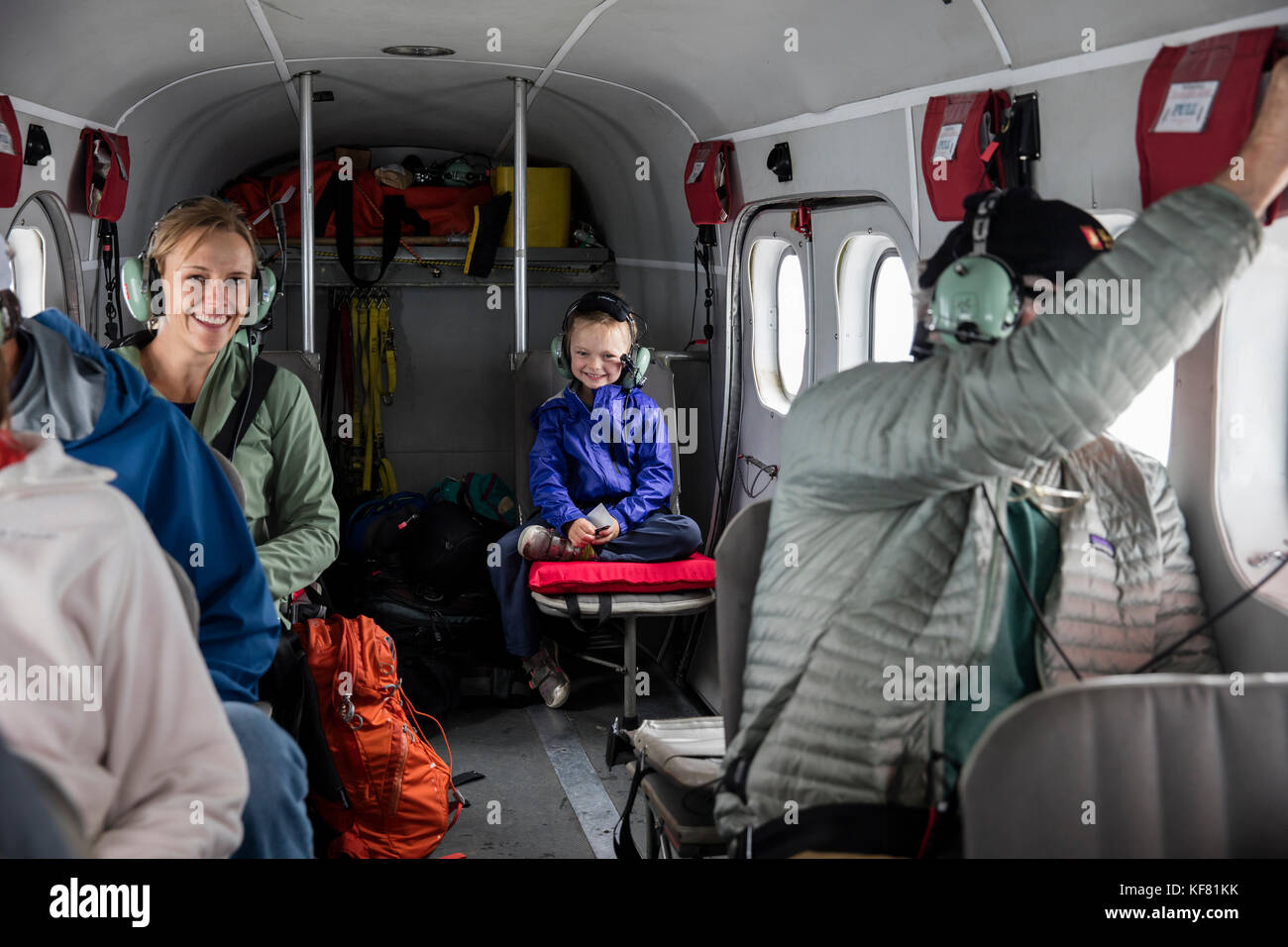 USA, Alaska, Anchorage, loading Rusts Flying Service float plane from ...