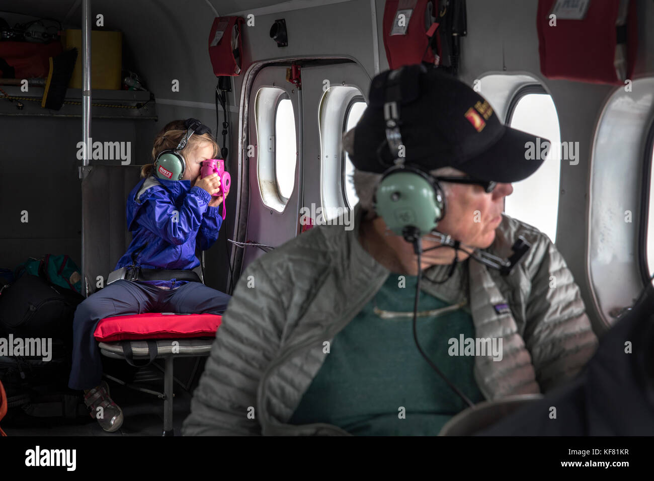 USA, Alaska, Anchorage, loading Rusts Flying Service float plane from ...