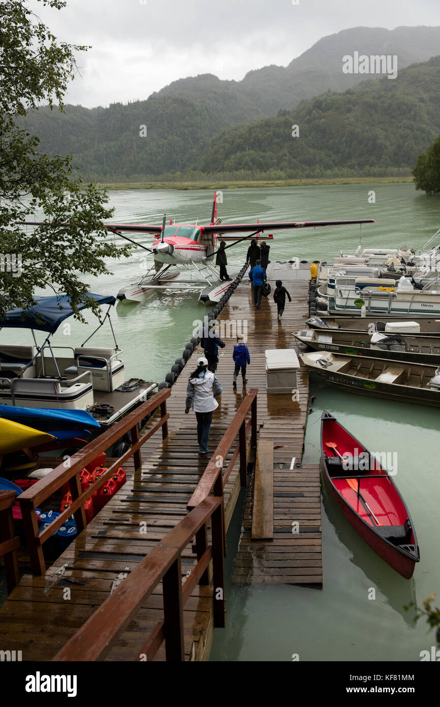 USA, Alaska, Redoubt Bay, Big River Lake, heading out on the dock to ...