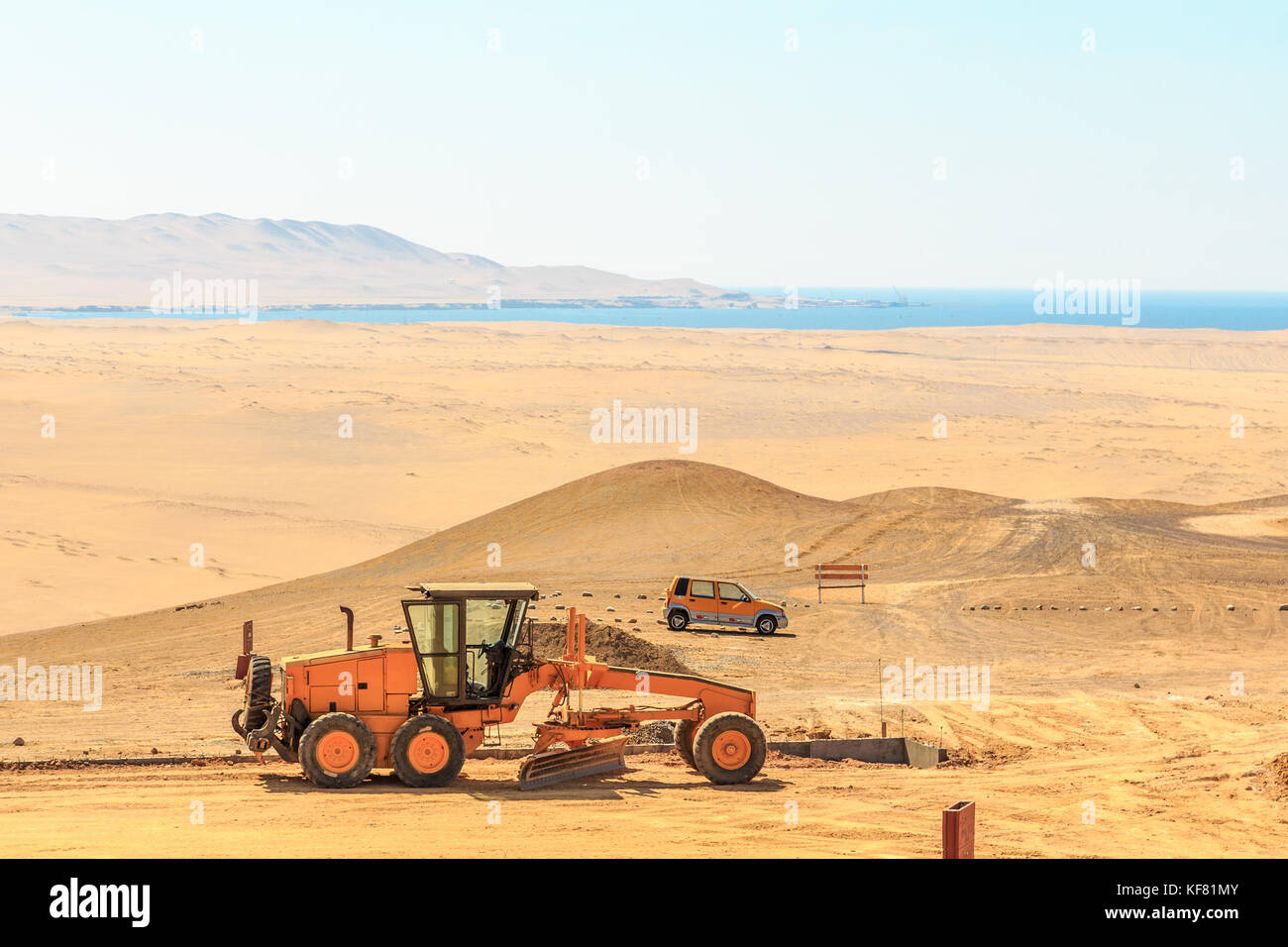 Blue sky with clouds and yellow sands of Paracas desert national park ...