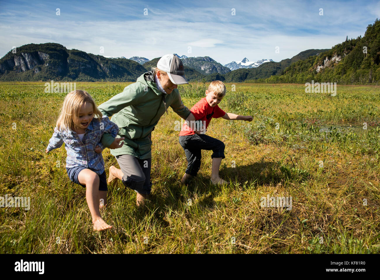 USA, Alaska, Redoubt Bay, Big River Lake, playing on the floating marsh ...