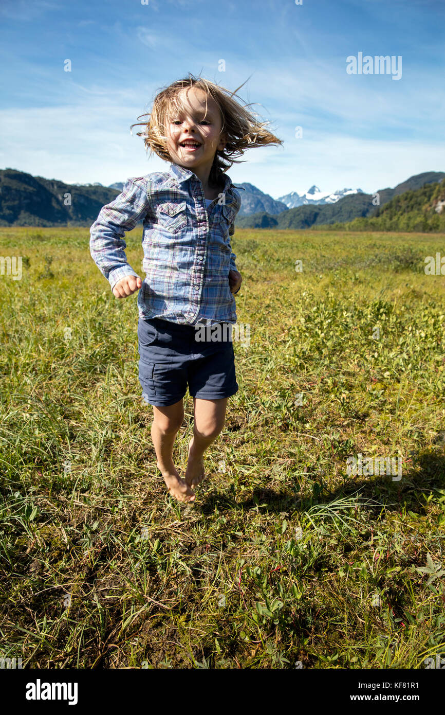 USA, Alaska, Redoubt Bay, Big River Lake, playing on the floating marsh ...