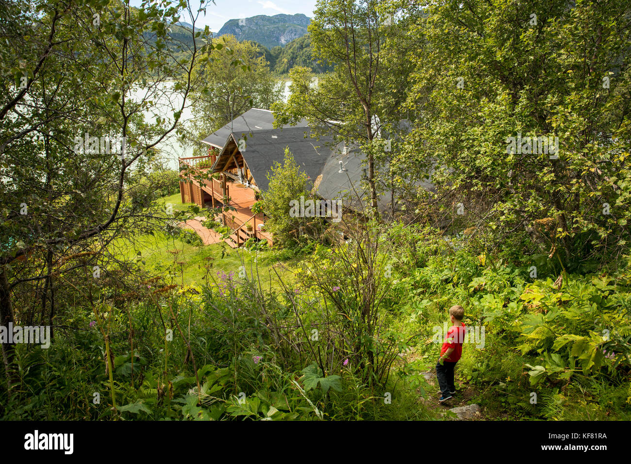 USA, Alaska, Redoubt Bay, Big River Lake, walking around the grounds at ...
