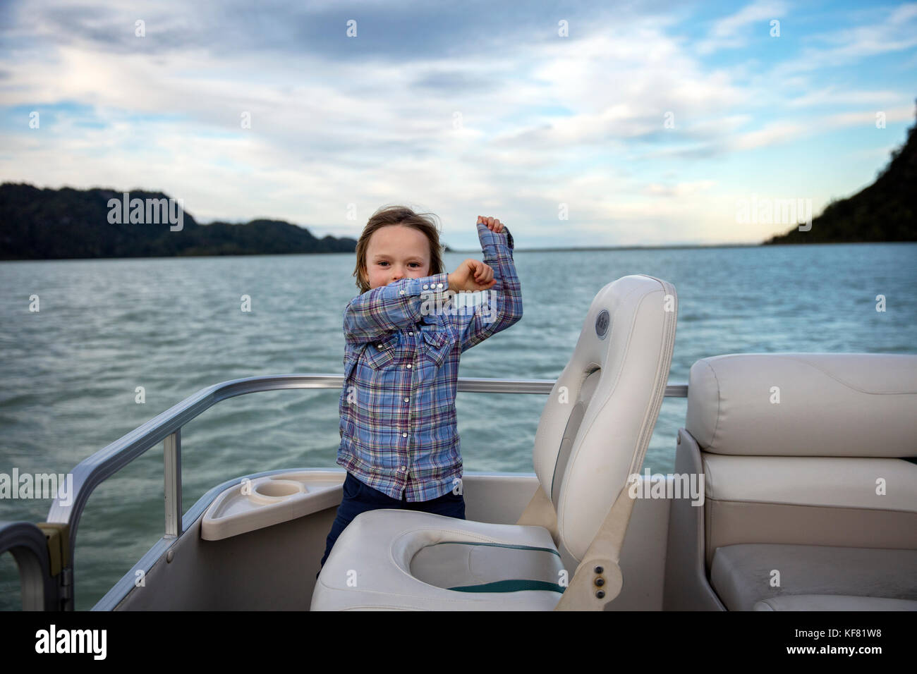 USA, Alaska, Redoubt Bay, Big River Lake, hanging out on the boat at ...