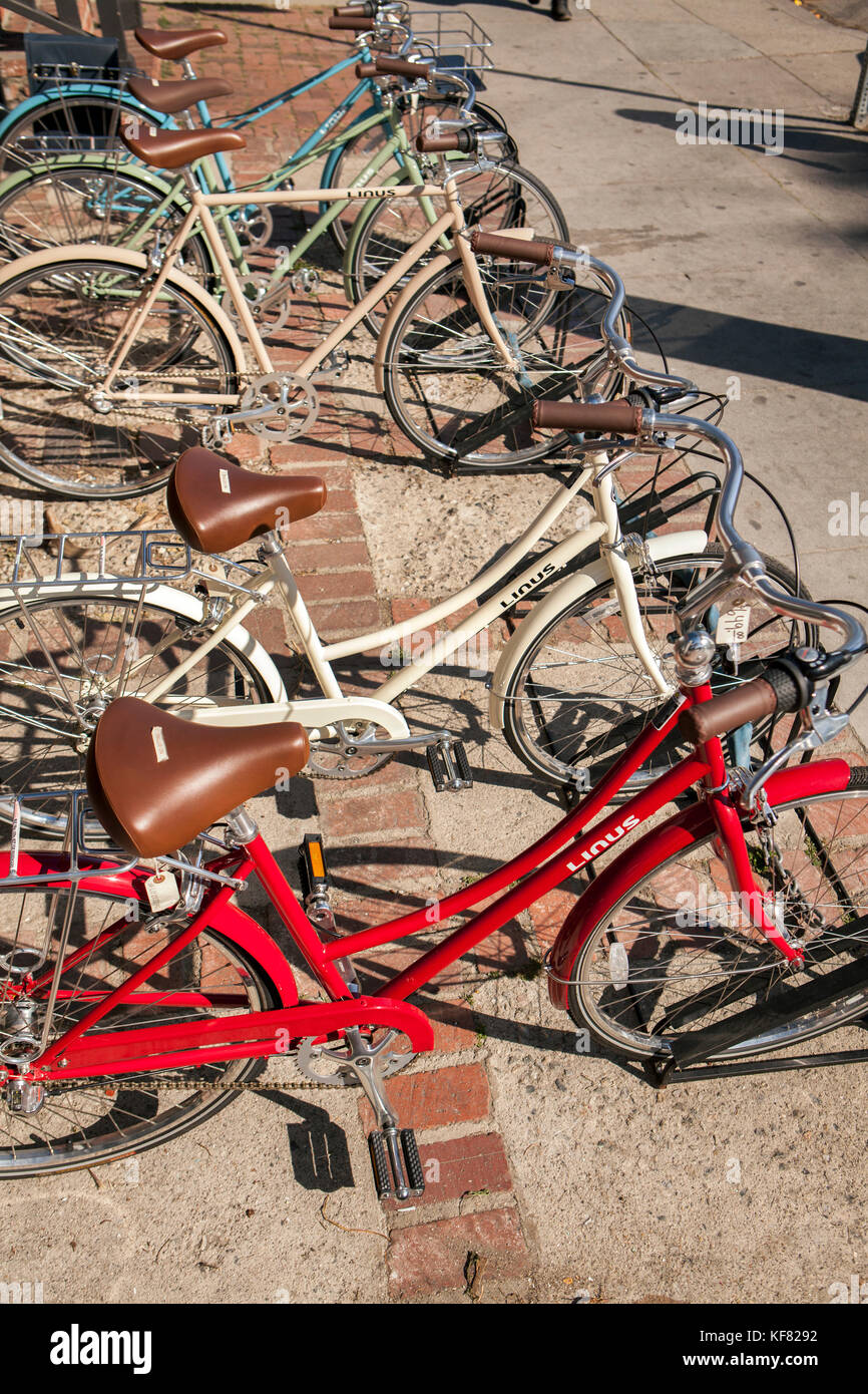 USA, Los Angeles, bikes locked up on the street of Abbot Kinney ...