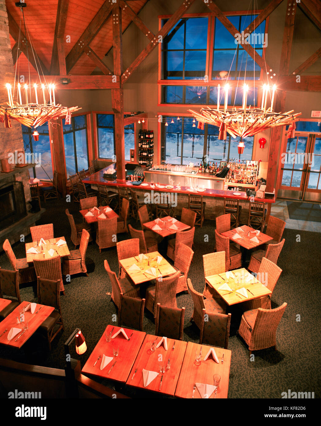 CANADA, BC Rockies, interior of illuminated restaurant at the top of ...