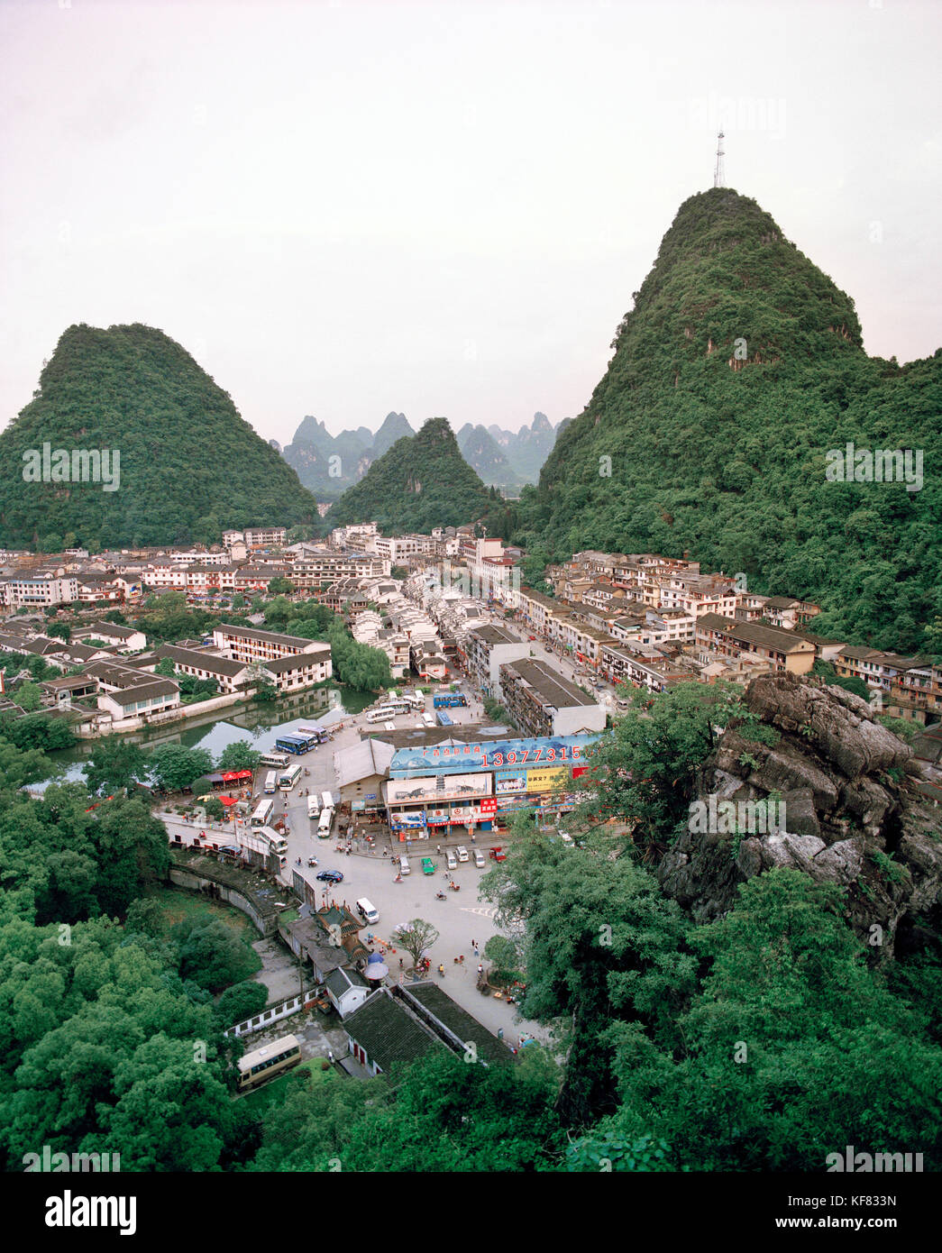 CHINA, Guilin, elevated view of Guilin and limestone spires at dusk ...
