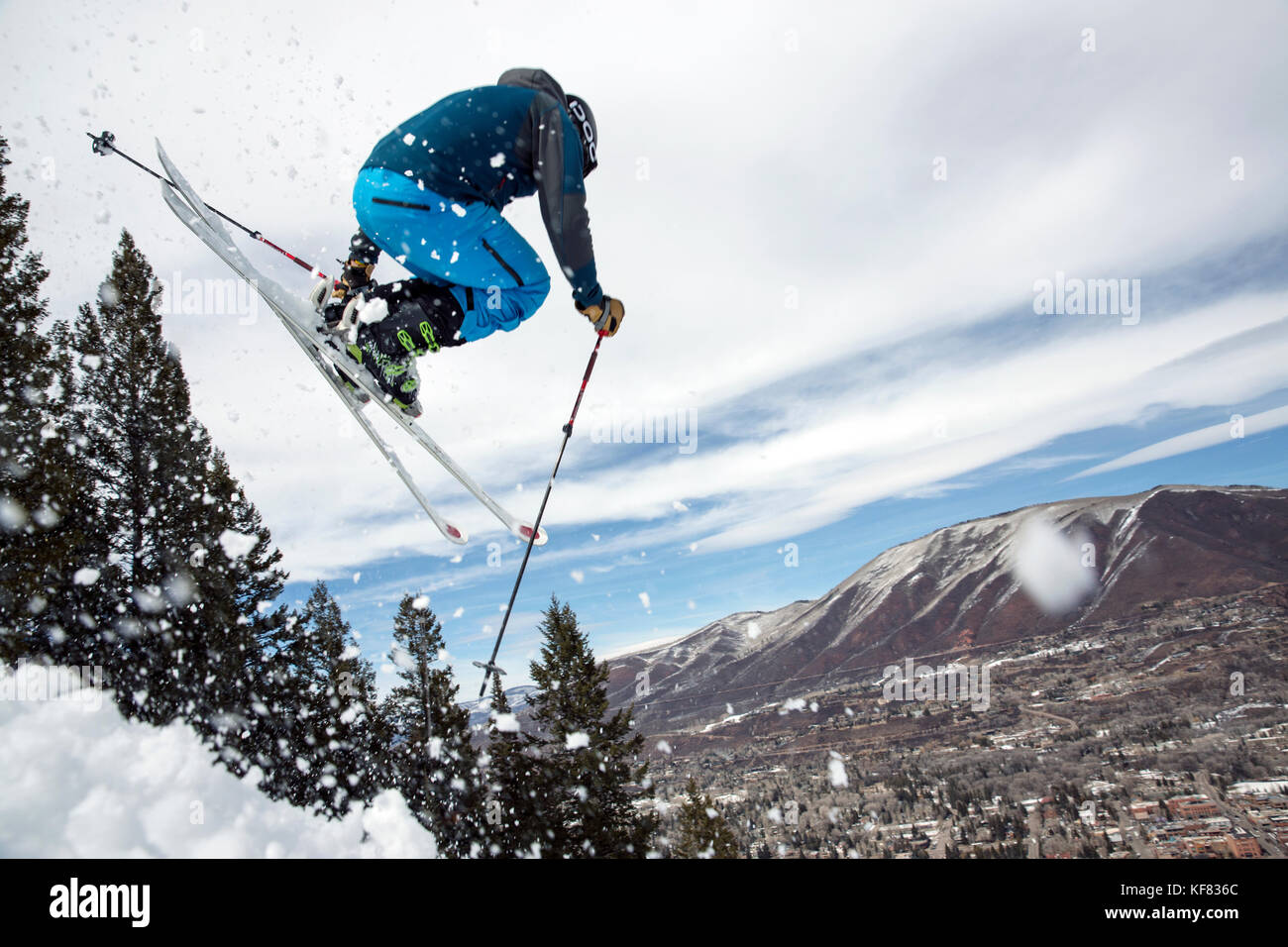 USA, Colorado, Aspen, skier getting air on a trail called Corkscrew ...