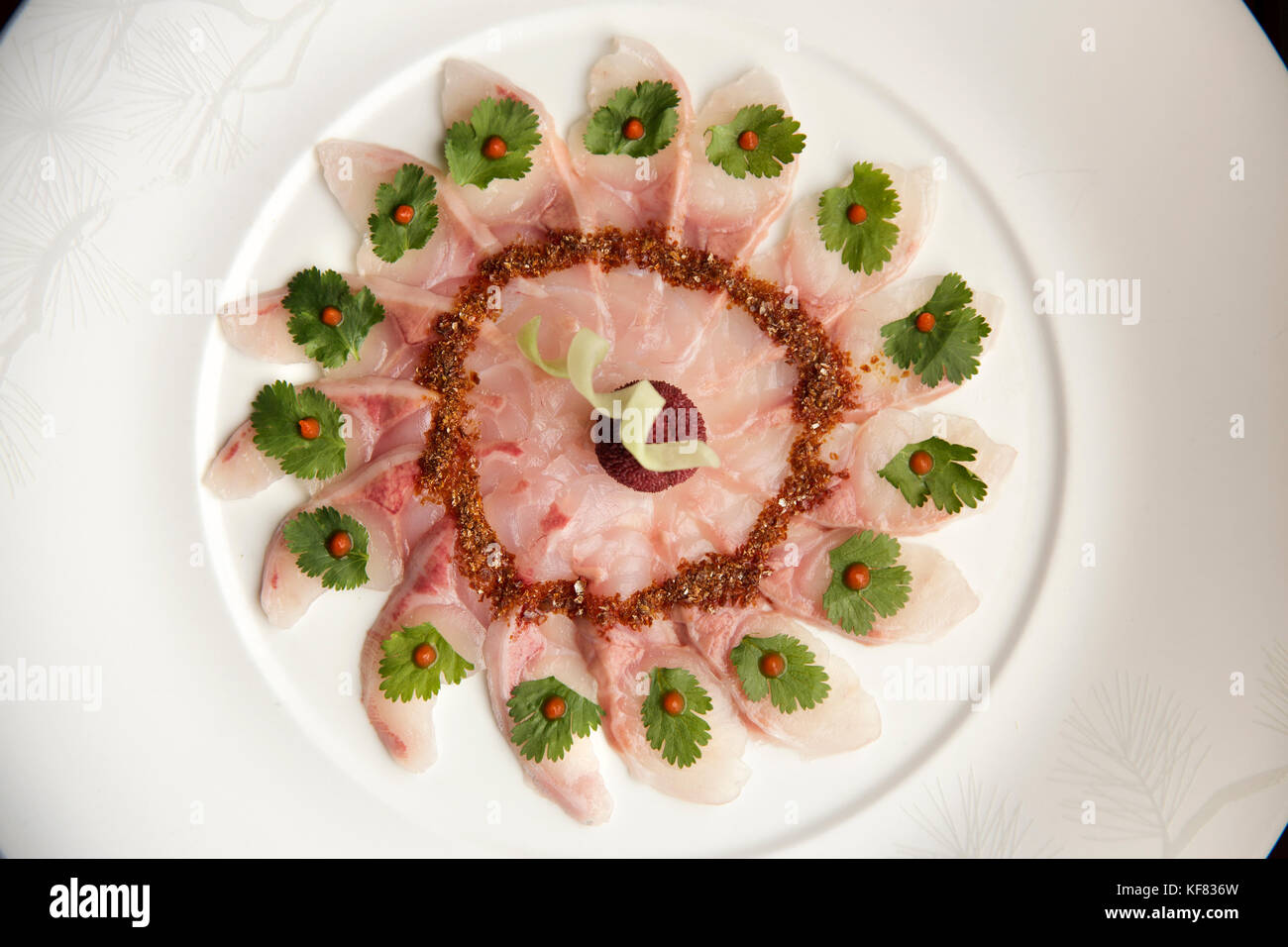 Garnishing fish hi-res stock photography and images - Alamy