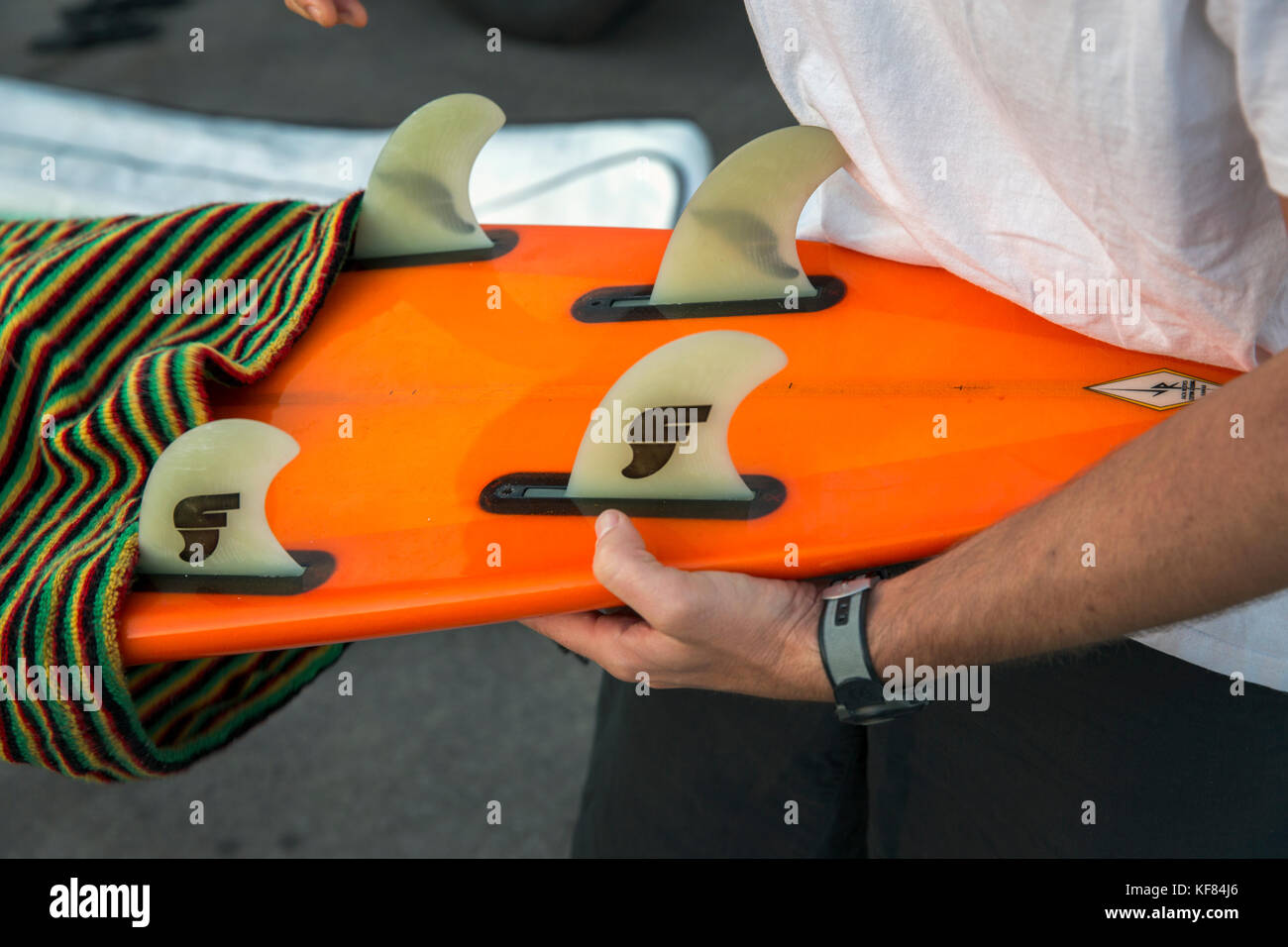 USA, HAWAII, Maui, Jaws, surfers prepping their boards and loading up ...