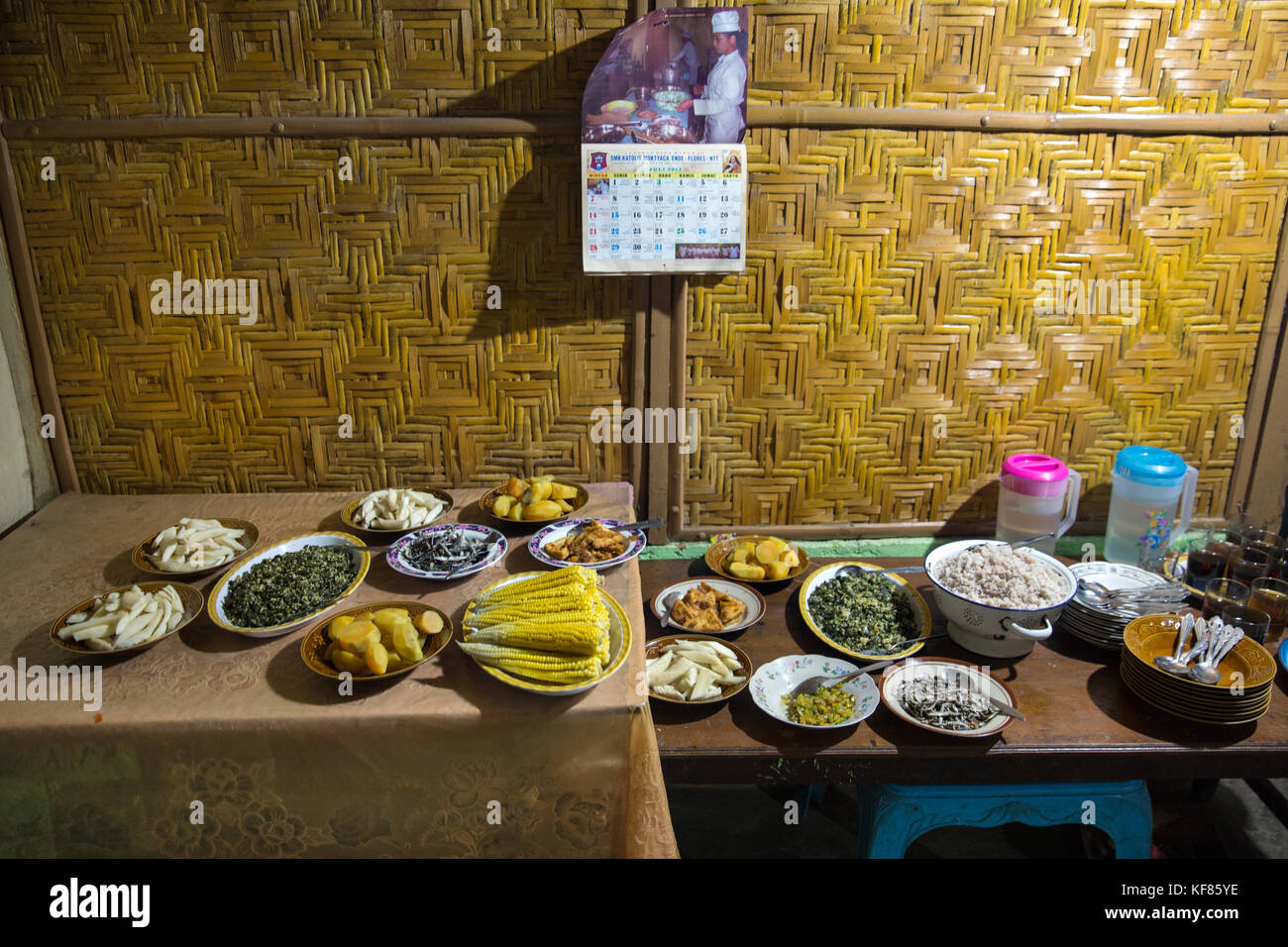 INDONESIA, Flores, Dinner is served at a home in Waturaka Village Stock ...