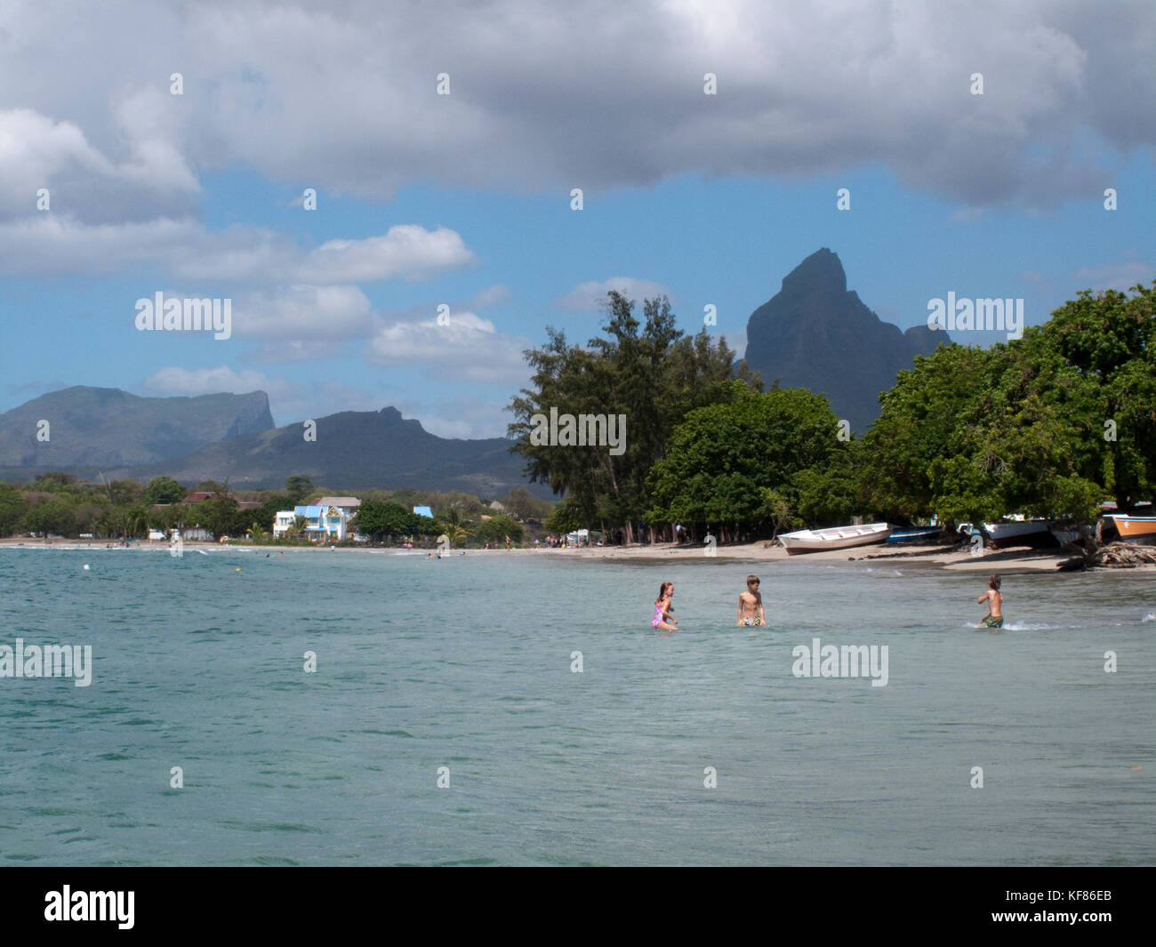 MAURITIUS, kids swimming in Tamarin Bay in the town of, Tamarin, Indian ...