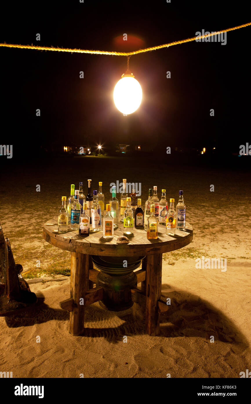 MAURITIUS, Chemin Grenier, a large selection of Rums fill a table at ...