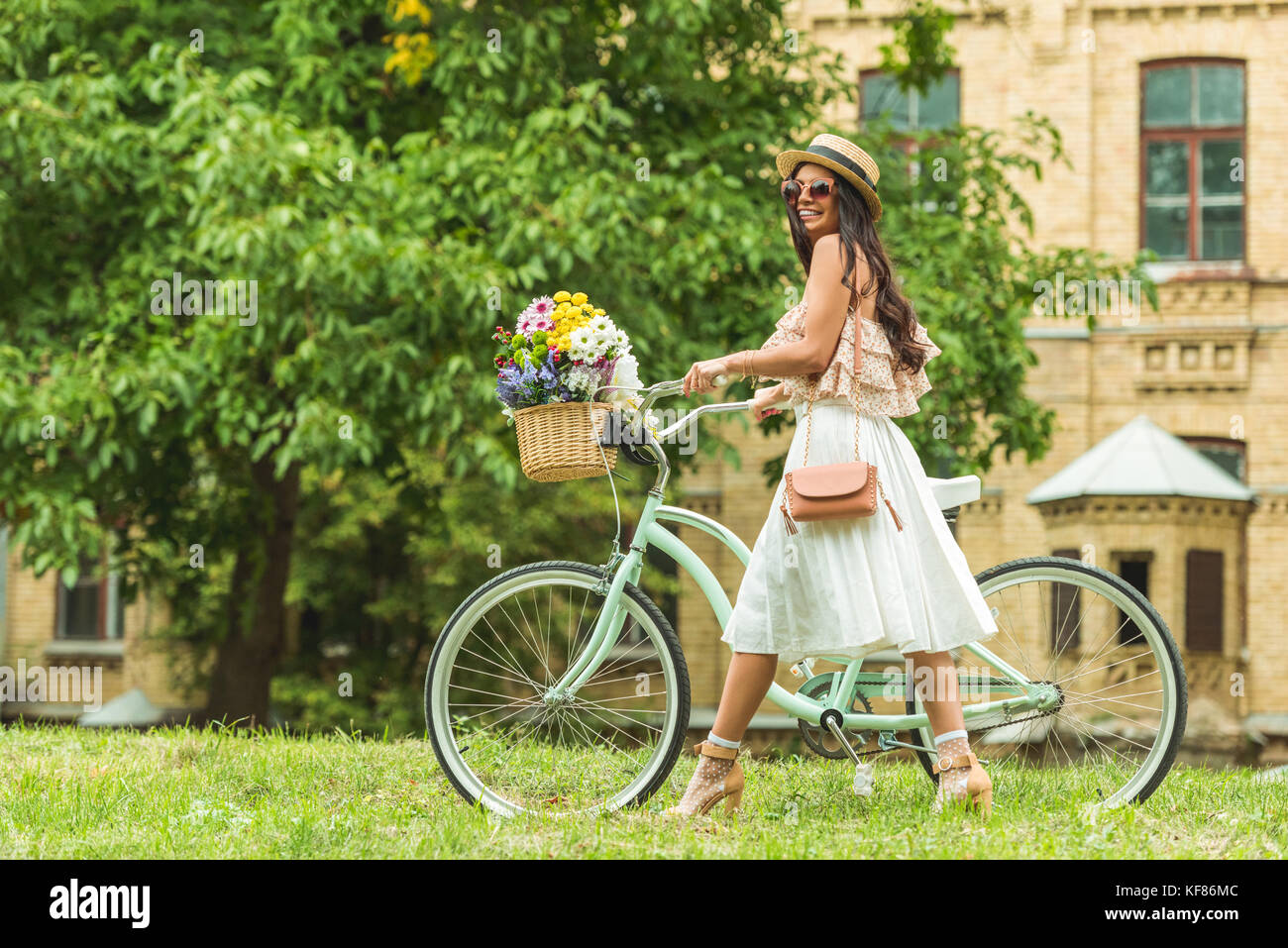 beautiful girl with bicycle Stock Photo - Alamy