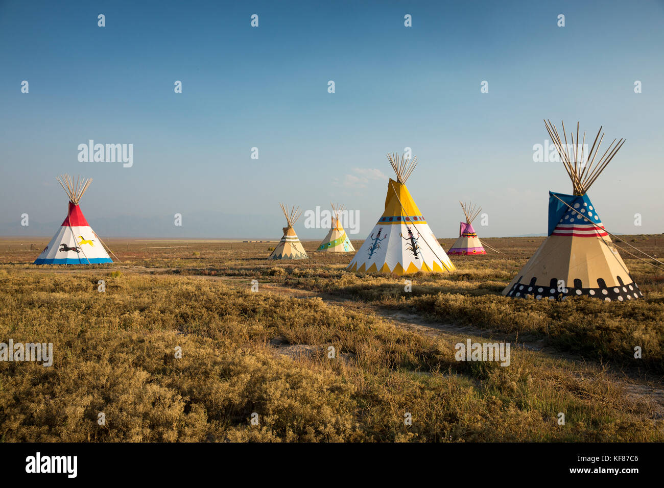 USA, Nevada, Wells, colorful tipis are scattered all over Mustang ...