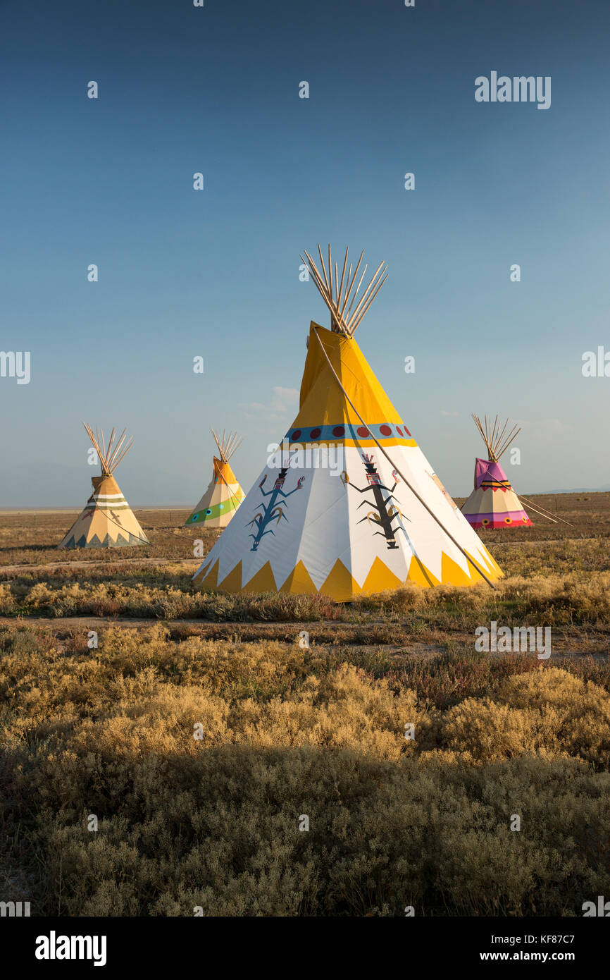 USA, Nevada, Wells, colorful tipis are scattered all over Mustang ...