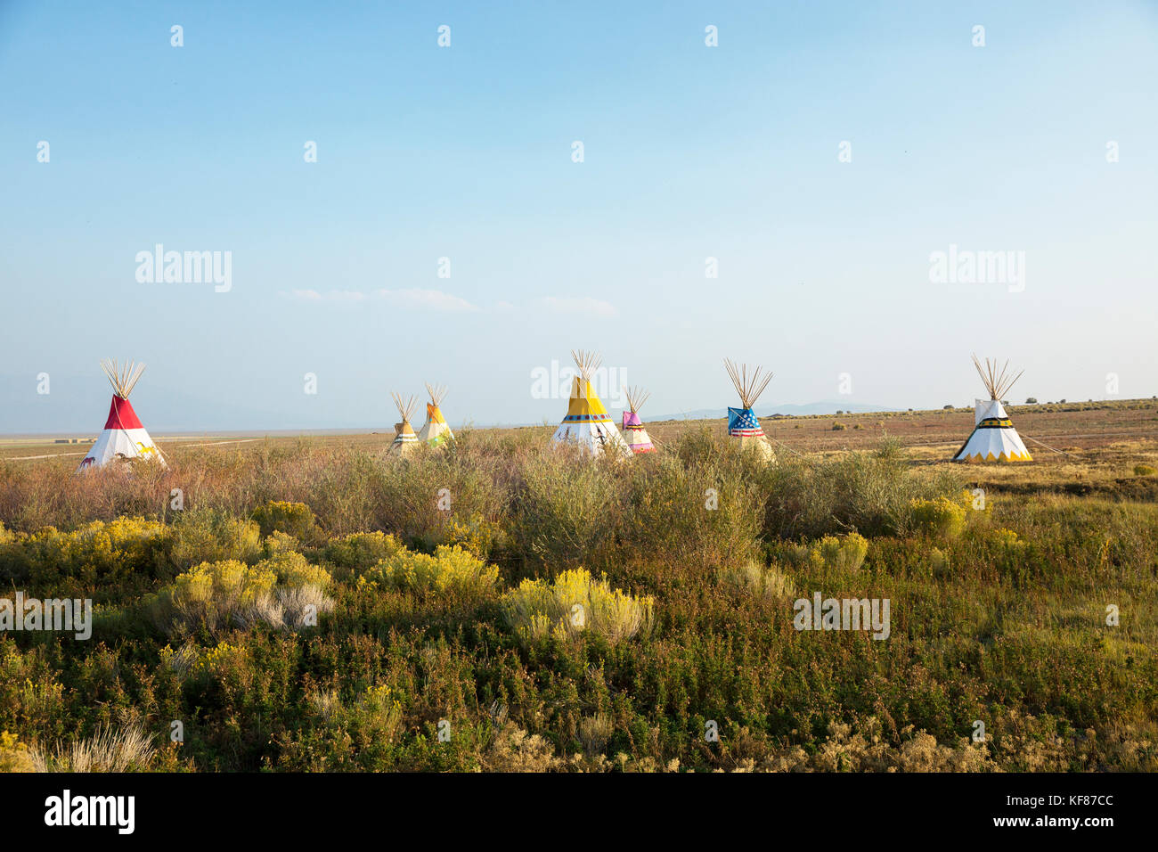 USA, Nevada, Wells, colorful tipis are scattered all over Mustang ...