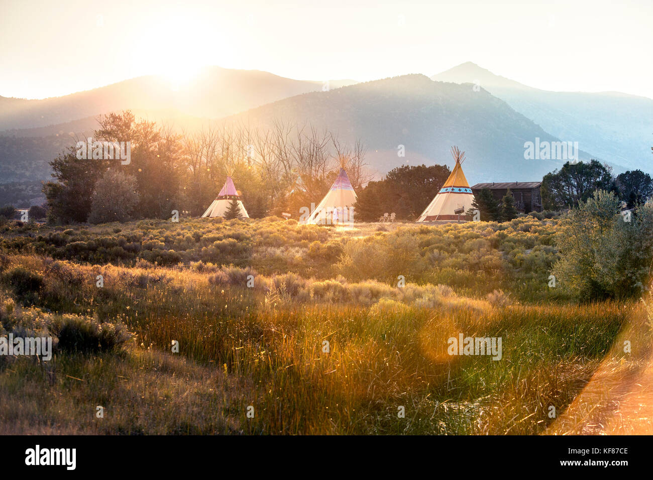 USA, Nevada, Wells, colorful tipis are scattered all over Mustang ...