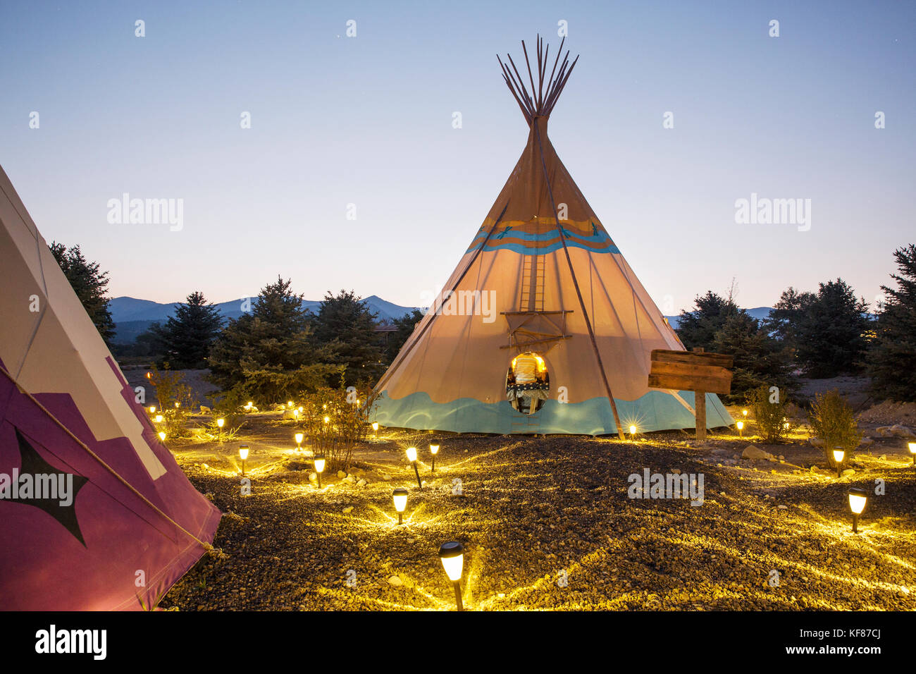 USA, Nevada, Wells, colorful tipis are scattered all over Mustang ...