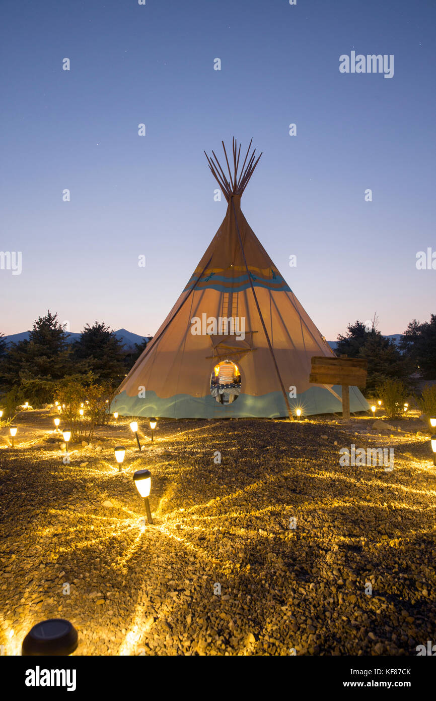 USA, Nevada, Wells, colorful tipis are scattered all over Mustang ...