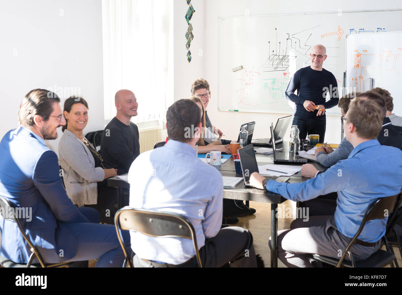 Relaxed informal IT business startup company team meeting Stock Photo ...