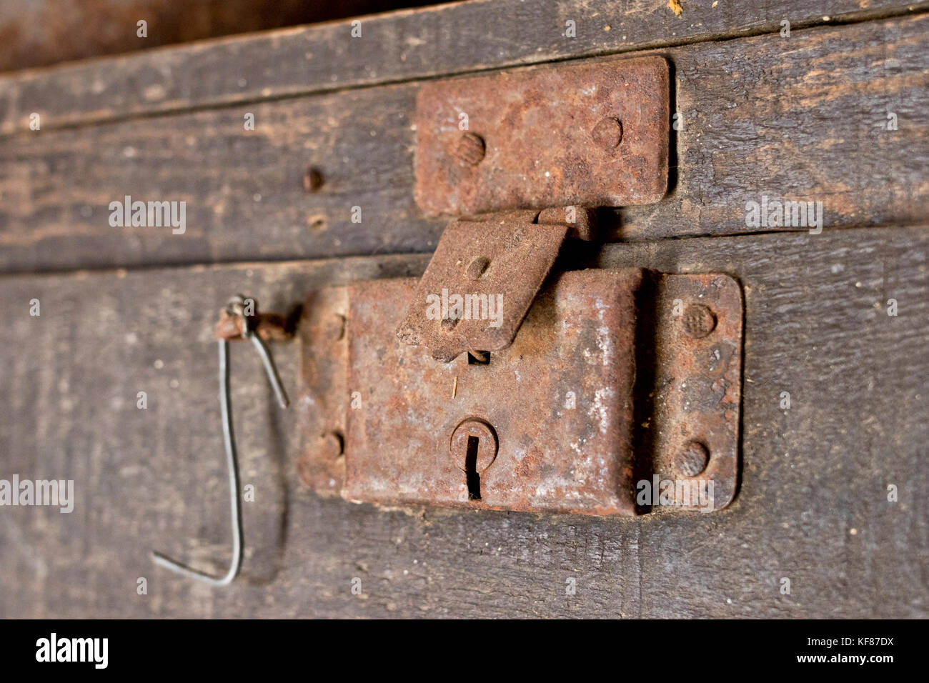 Closeup image of a rusty lock from an old trunk Stock Photo - Alamy