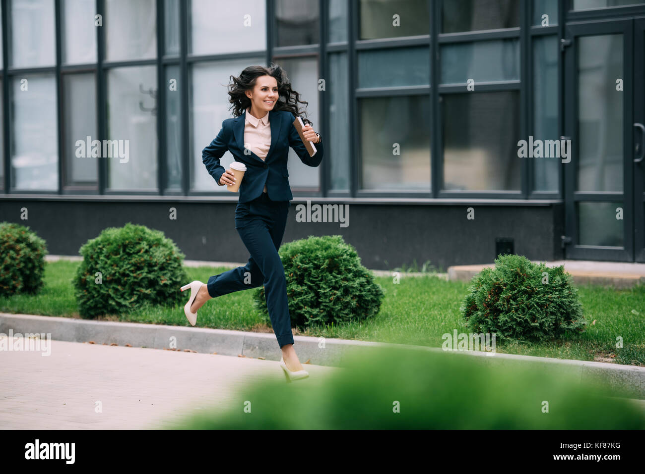 businesswoman running to work Stock Photo - Alamy