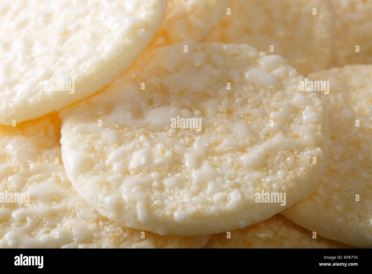 Crispy Japanese rice cakes with sugar macro. horizontal background ...