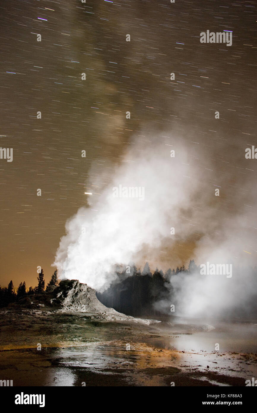 Old faithful yellowstone geyser night hi-res stock photography and ...