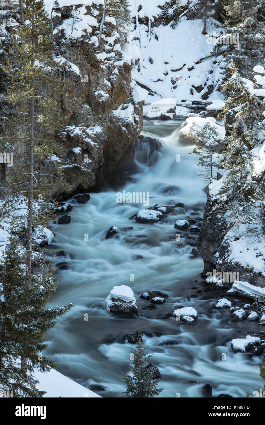 USA, Wyoming, Yellowstone National Park, the Firehole river spills over ...