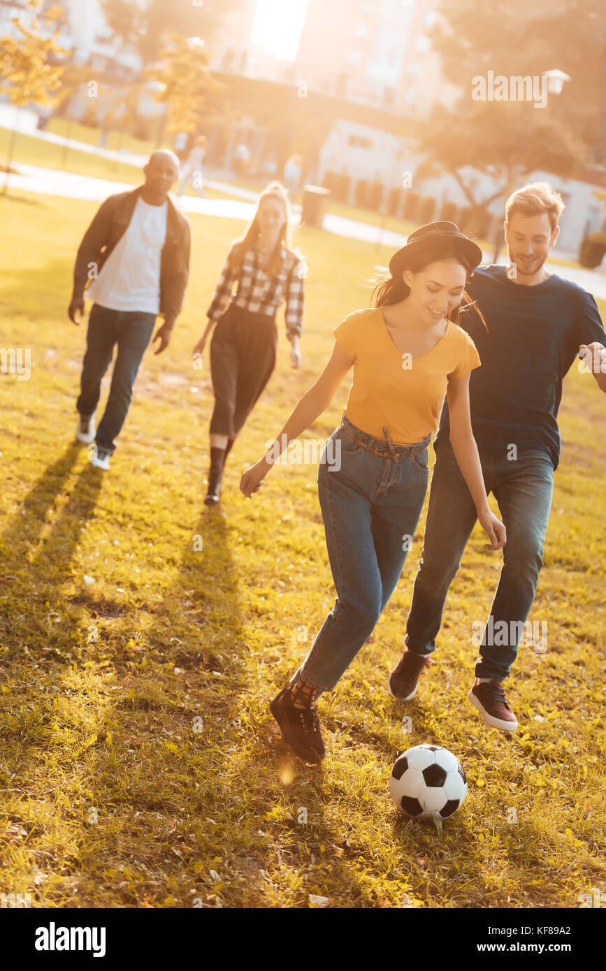 Friends playing soccer hi-res stock photography and images - Alamy