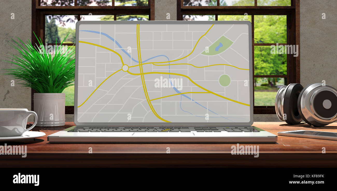 Laptop with map screen and silver color placed on a wooden desk, Room ...