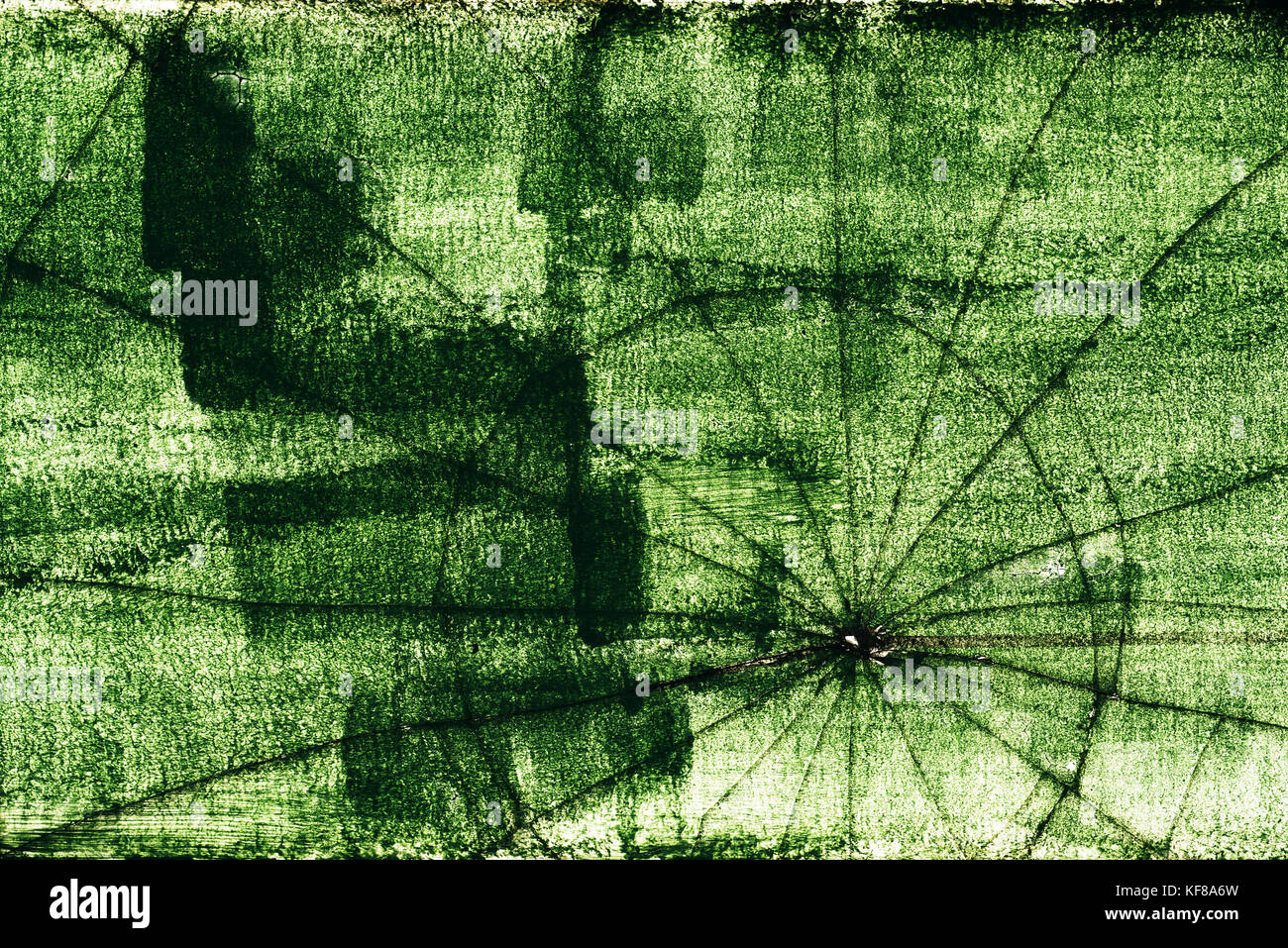 Crack pattern on broken green glass surface, abstract grunge texture ...