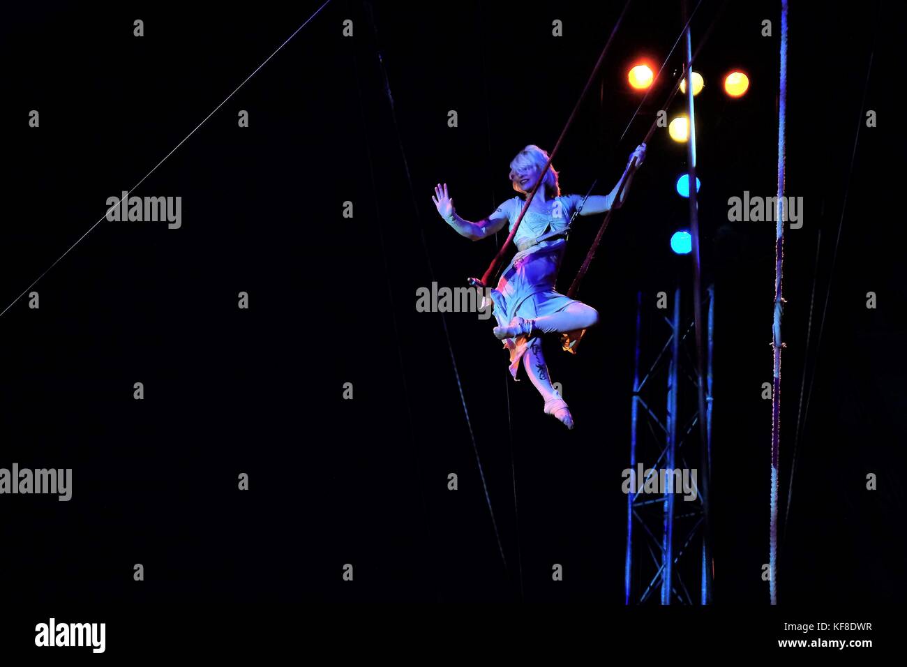 circus trapeze artist on swing Stock Photo - Alamy